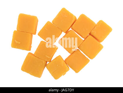 A portion of cubed mild cheddar cheese pieces isolated on a white ...