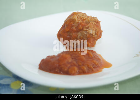 a typical Italian recipe: rissole of mincemeat with tomato sauce Stock ...