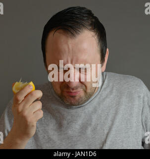 Man making sour face, portrait Stock Photo - Alamy