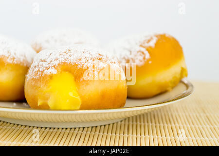 cluster of donuts on a white plate Stock Photo - Alamy