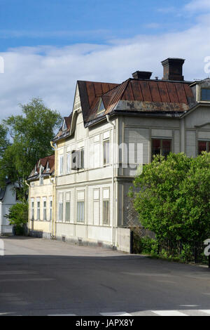 An old weathered building facade surrounded by greenery Stock Photo - Alamy