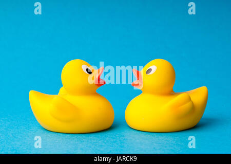 two yellow plastic toy ducks isolated Stock Photo - Alamy