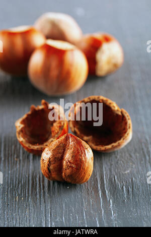 Hazelnut heap isolated over natural background Stock Photo - Alamy