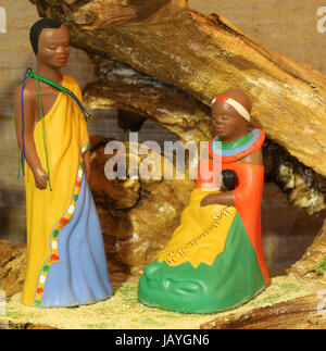 Kenya nativity scene with wooden statues with colored African clothes ...