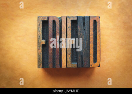 The word -FRIEND- written in vintage, dirty metal letterpress type on a ...