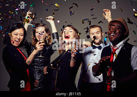 Celebrating Momentous Event with Friends Stock Photo - Alamy