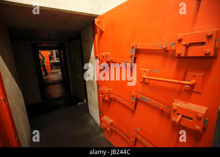 Red metal blast door in an underground bunker Stock Photo - Alamy