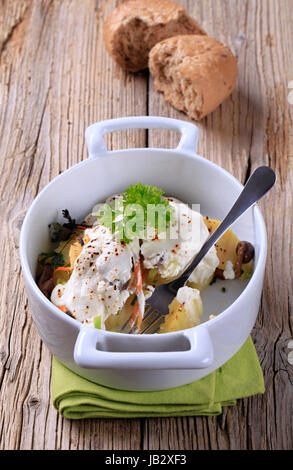 Salad with potatoes, sour cream and mushrooms Stock Photo - Alamy