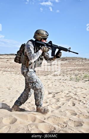 American Infantry Soldier Going Through Forest Road In Cold Winter Day ...