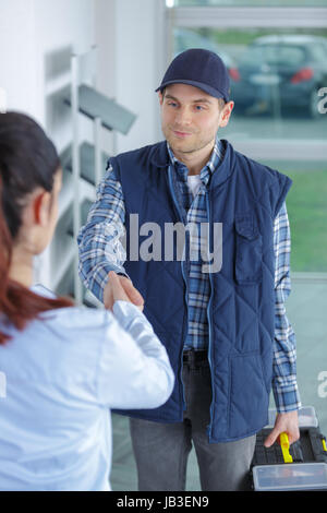 construction worker renovating clients house Stock Photo - Alamy