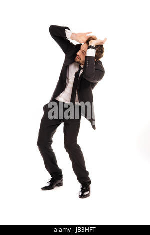 man in suit cowering isolated on white Stock Photo - Alamy