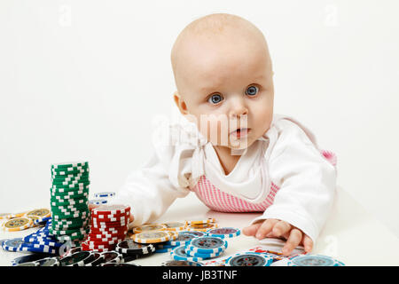 Child playing poker at green table with white background Stock Photo ...