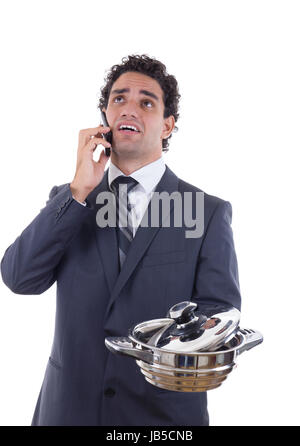 sad man with cooking pot seeking lunch on mobile phone Stock Photo - Alamy