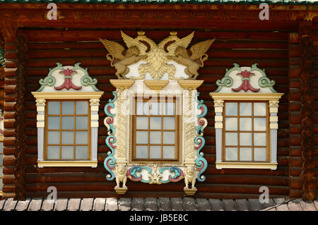 Russian carved wooden frames beautify exterior of timbered house Stock ...