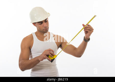 Physically fit attractive hispanic construction worker Stock Photo - Alamy