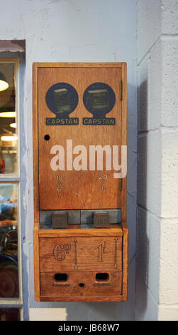A vintage cigarette machine selling Capstan full strength cigarettes ...