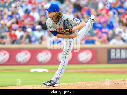 Texas Rangers starting pitcher Jacob deGrom reacts after walking ...