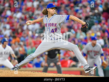 Texas Rangers starting pitcher Jacob deGrom looks on during spring ...