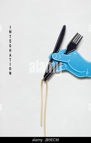 fusilli pasta noodles in a hand, isolated on a white background Stock ...