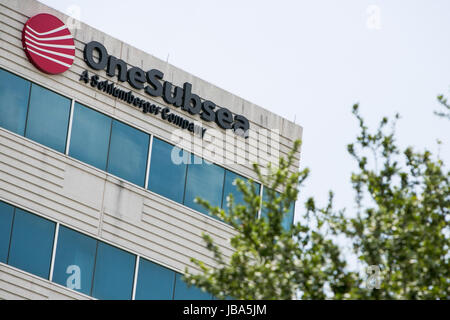 A logo sign outside of the headquarters of OneSubsea in Houston, Texas ...