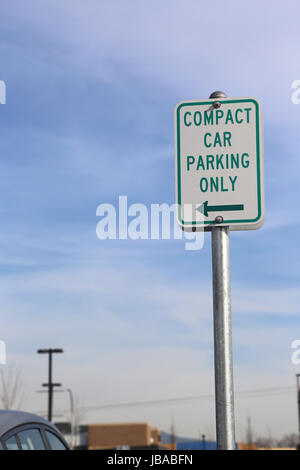 Compact car parking only sign Stock Photo - Alamy