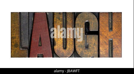 The word "Laugh" written in vintage metal letterpress type on an aged ...