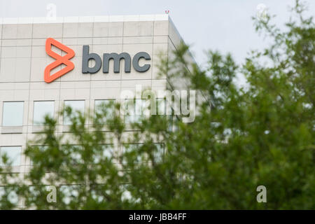 A logo sign outside of the headquarters of BMC Software in Houston ...