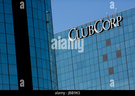 A logo sign outside of the headquarters of ClubCorp in Dallas, Texas ...