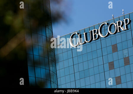 A logo sign outside of the headquarters of ClubCorp in Dallas, Texas ...