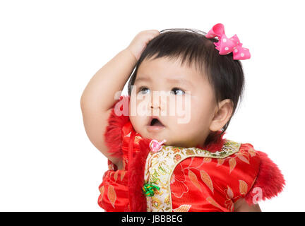 Chinese baby girl scratch her hair Stock Photo - Alamy