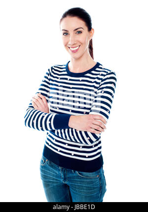 Confident lady in casuals with arms crossed Stock Photo - Alamy