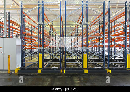 Mobile roller racking system in distribution warehouse Stock Photo ...