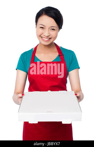 Attractive asian female chef delivering pizza Stock Photo - Alamy