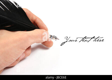 hand hold a feather quill pen on the letter and envelope, pencil Stock ...