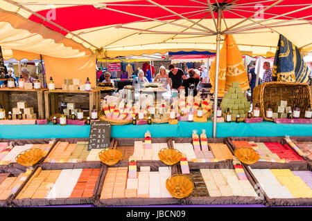 Colorful soaps on a market stall with baskets Stock Photo - Alamy