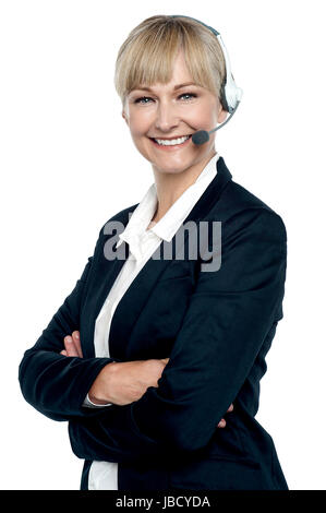 Cheerful female telecaller wearing headset and posing confidently with ...