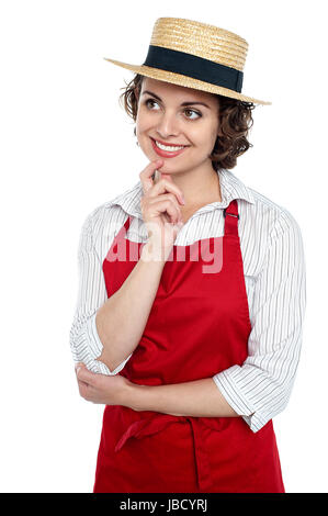 smiling female chef dreaming Stock Photo - Alamy