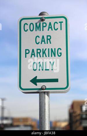 Compact car parking only sign Stock Photo - Alamy