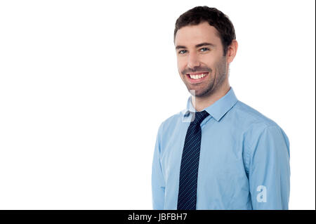 Smiling sales executive isolated over white Stock Photo - Alamy