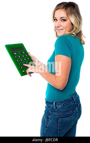 Teen girl posing with calculator Stock Photo - Alamy