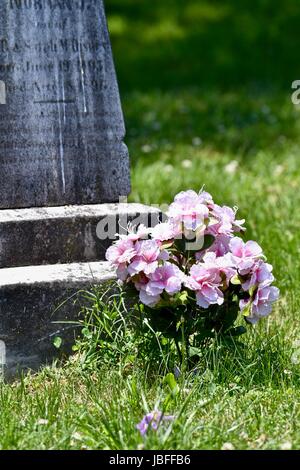 Flowers laid at a memorial stone in Mottram, Tameside, unveiled to ...