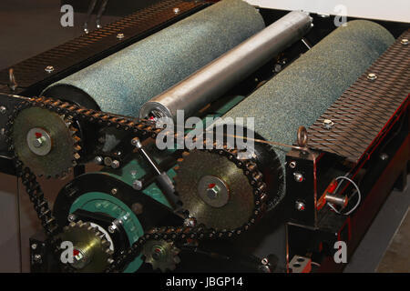 Brake MOT test equipment rollers with chain drive Stock Photo - Alamy