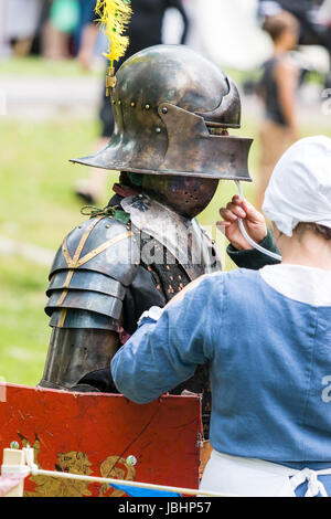 Knight being dressed in armor. Hand-colored woodcut of a John Gilbert ...