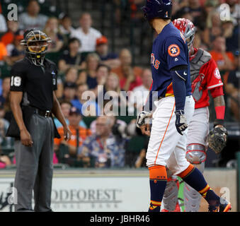 Home plate umpire Ramon De Jesus in the second inning of a baseball ...
