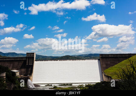 Inanda Dam fill to capacity and water flowing over the high wall Stock ...