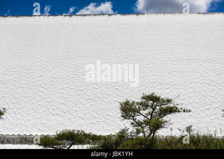 Inanda Dam fill to capacity and water flowing over the high wall Stock ...
