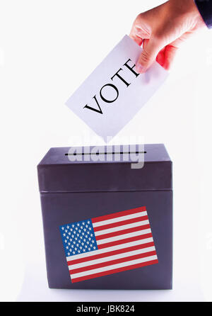 Urn for vote, with male hand posting vote and UK banner Stock Photo - Alamy