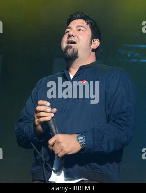 Chino Moreno, lead singer of the band the Deftones, performing on stage ...