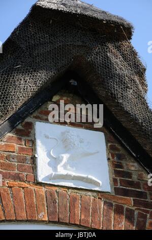 Lion Crest on cottage, Lilley, Hertfordshire Stock Photo - Alamy