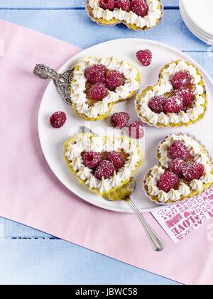 Raspberry cake for Valentine's Day with hearts Stock Photo - Alamy